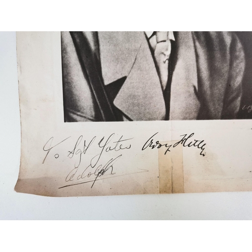 A printed portrait of Adolf Hitler, taken from an original photo by ...