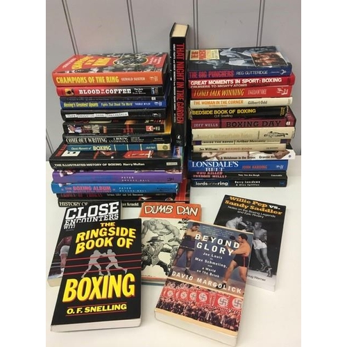 A collection of Boxing-related books. Themes include great fights ...