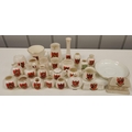 A twenty-six-piece collection of Warminster crested ware.