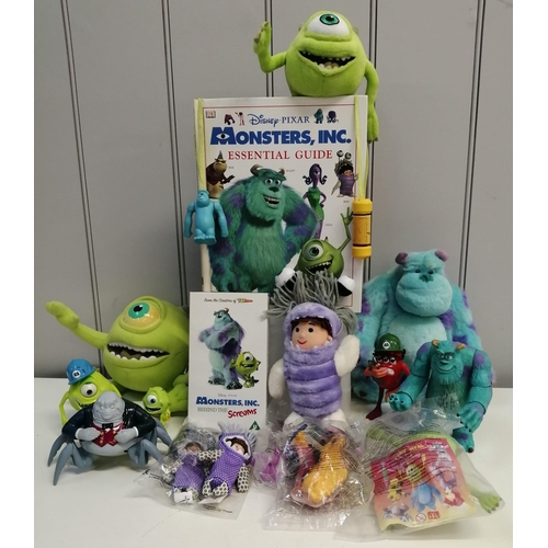 A collection of eighteen pieces of Monsters Inc. merchandise. To ...