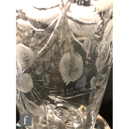 A large Tudor Crystal glass vase of footed conical form decorated in ...