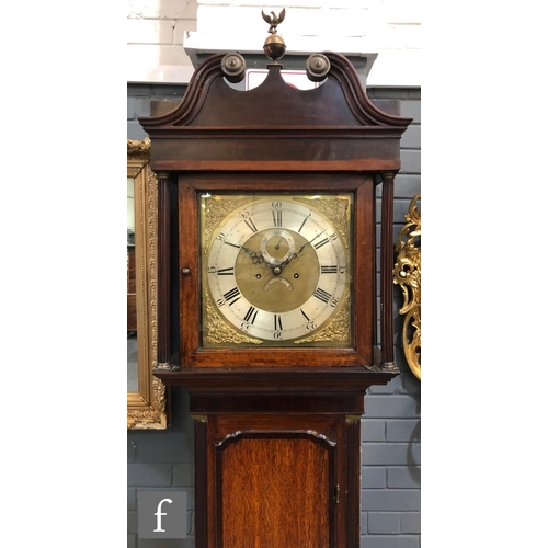 A 19th Century oak and mahogany cross-banded longcase clock with eight ...