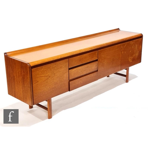 White and Newton - A Petersfield teak sideboard, with concave ledge ...