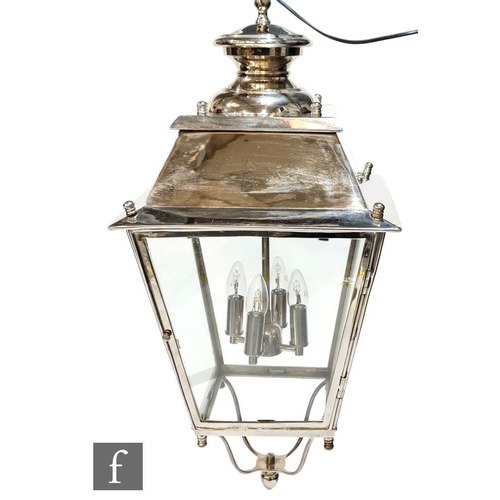 Unknown - A contemporary lantern style chandelier, the chrome metalwork ...