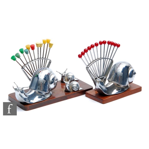 A bar top cocktail stick holder in the form of a snail in chrome plated ...