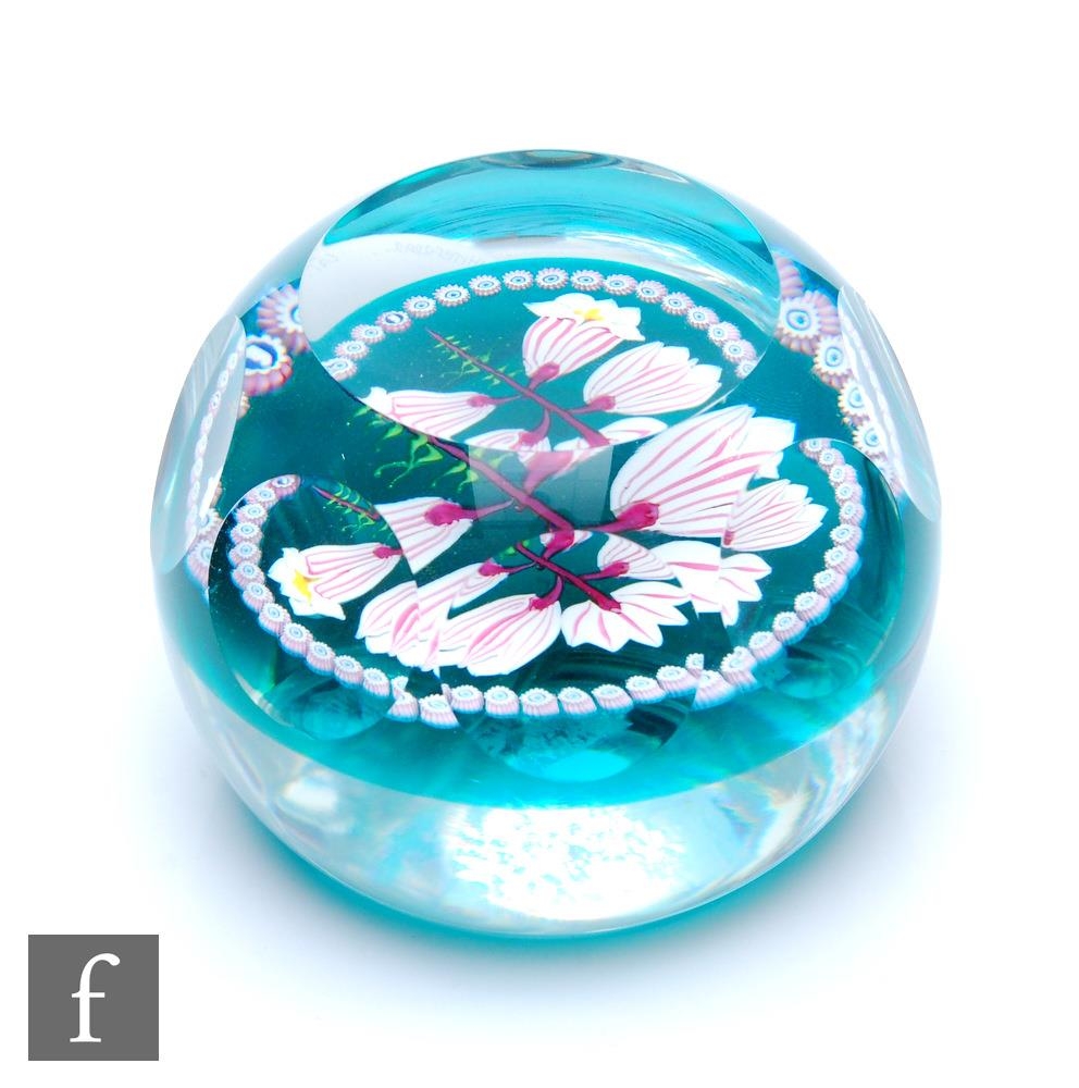 A Caithness Whitefriars glass paperweight in the Regal Lily pattern ...