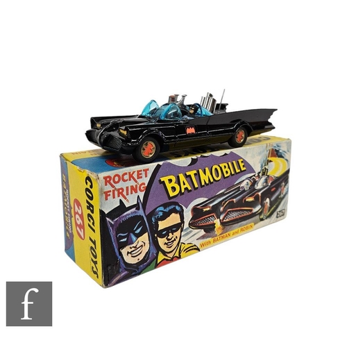 A Corgi 267 Batman Batmobile in black with blue tinted windscreen, red ...