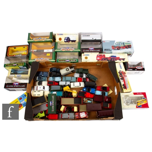 A large collection of assorted unboxed diecast models and empty boxes ...
