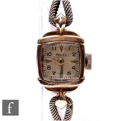 A 9ct lady's Majex wrist watch, Arabic numerals and batons mix to a ...