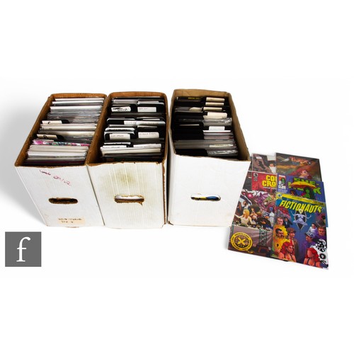 Three comic storage boxes of modern age comics including DC Superman ...