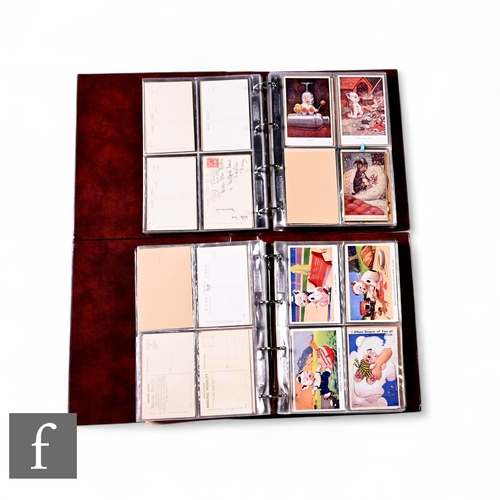 Two albums containing an extensive collection of cards of the comical ...