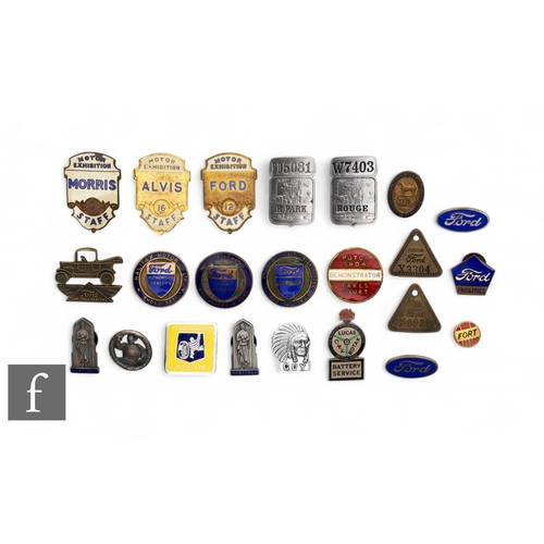 Two Ford employee badges stamped H Park FD5081 and Rouge W7403, also ...