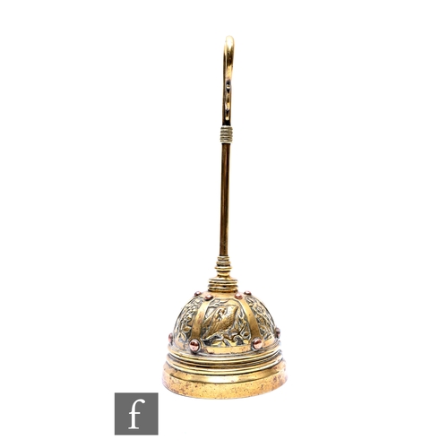 A late 19th Century brass and copper studded doorstop in the Aesthetic ...
