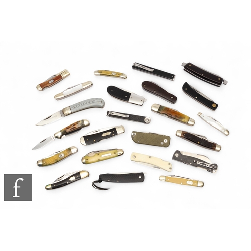 A collection of various folding pocket knives, to include various multi ...