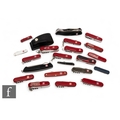 A collection of various Wenger multi tool Swiss Army Knives, to include ...