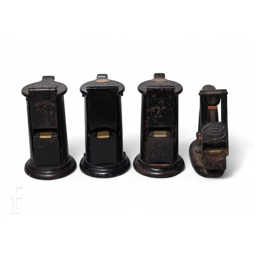 Four late 19th and early 20th Century railway ticket machines, one ...