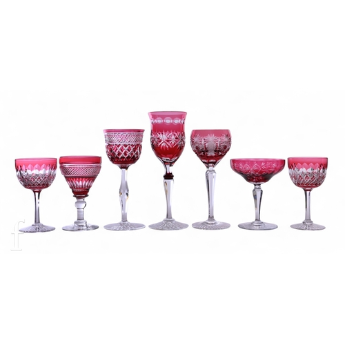 A Collection Of Ruby Glass Stemware Flash Cut Over Clear On Facet Cut