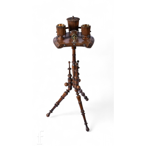 A late Victorian stained beech novelty smokers compendium table, with ...