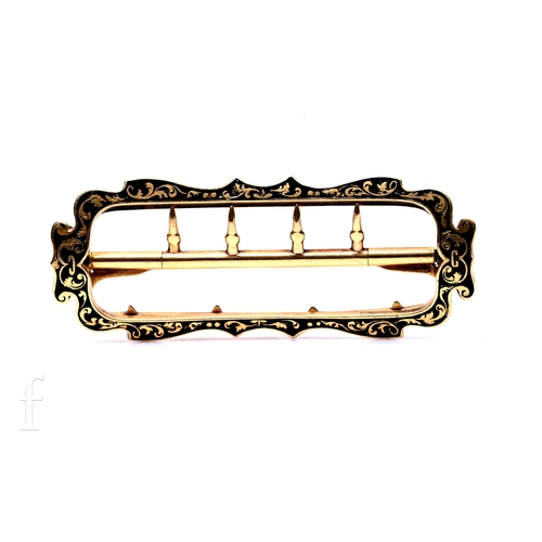 An early Victorian enamel buckle, circa 1840, the undulating mount with ...