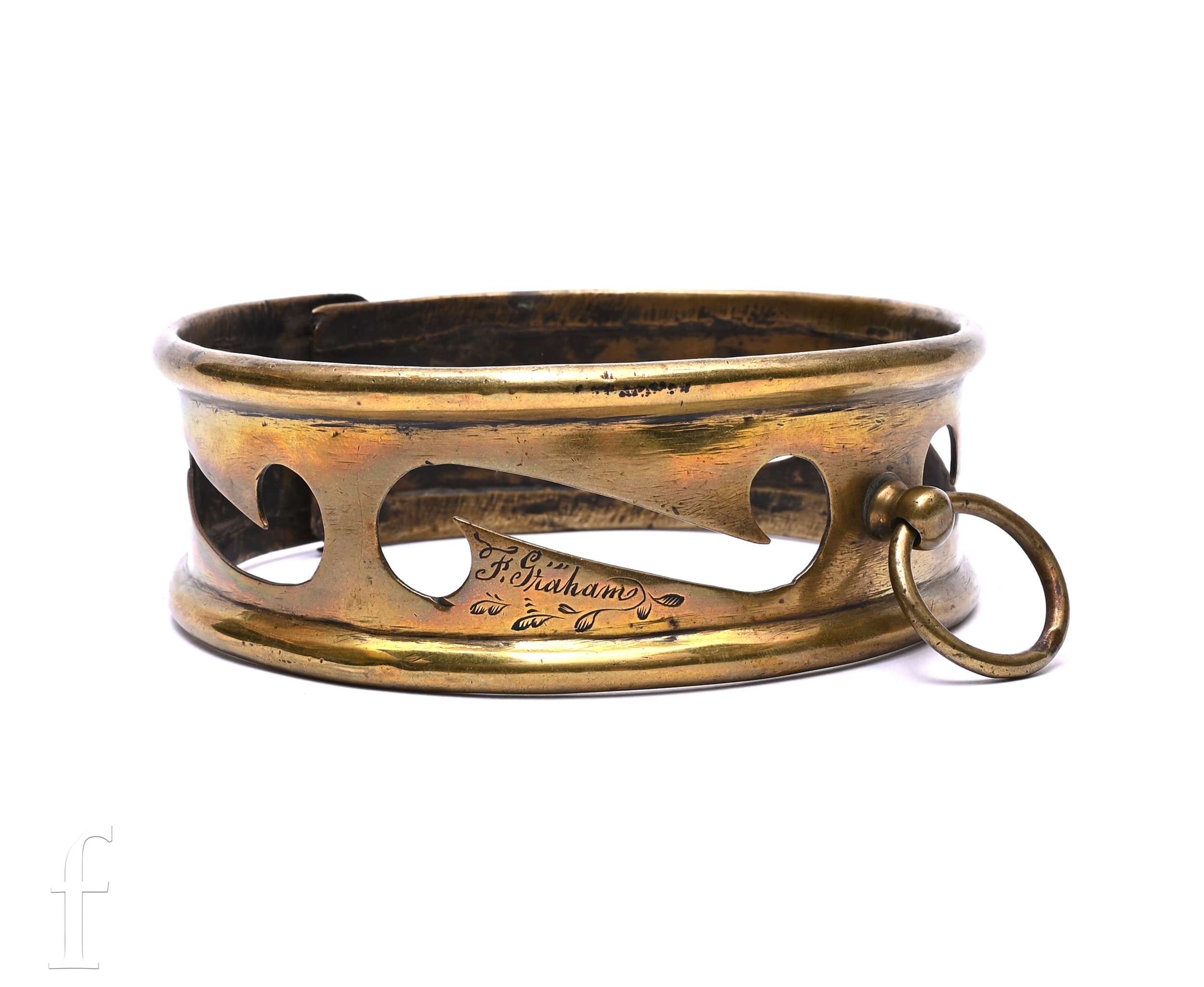 A 19th Century brass dog collar, pierced scroll work decoration with ...