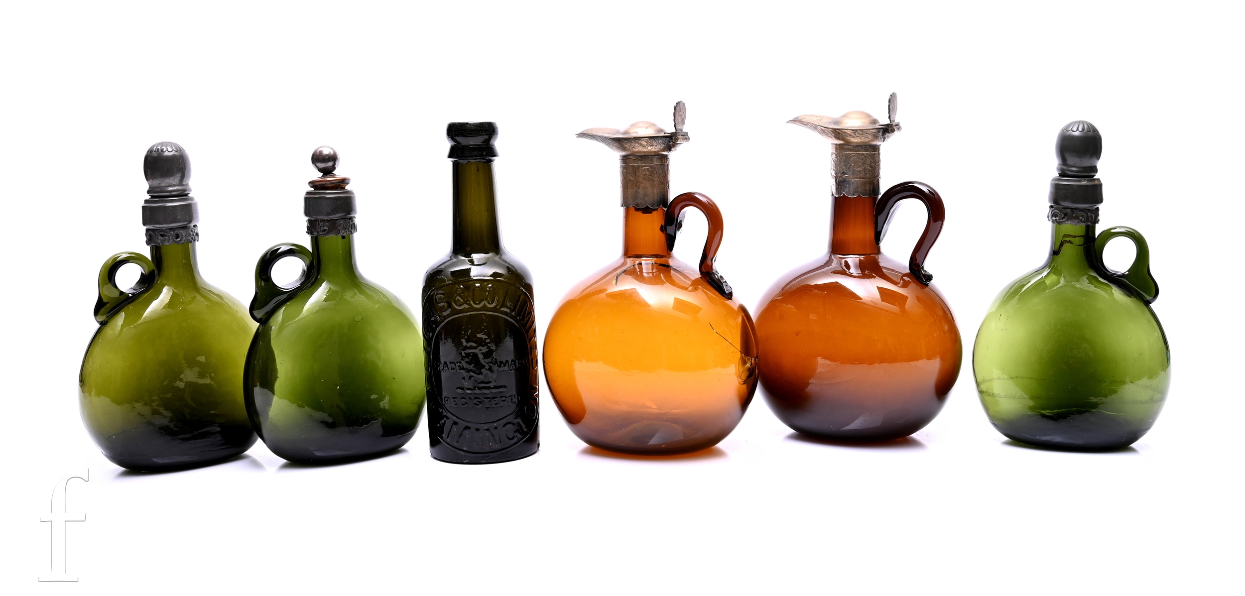A collection of late 18th to early 19th Century brown and green glass ...