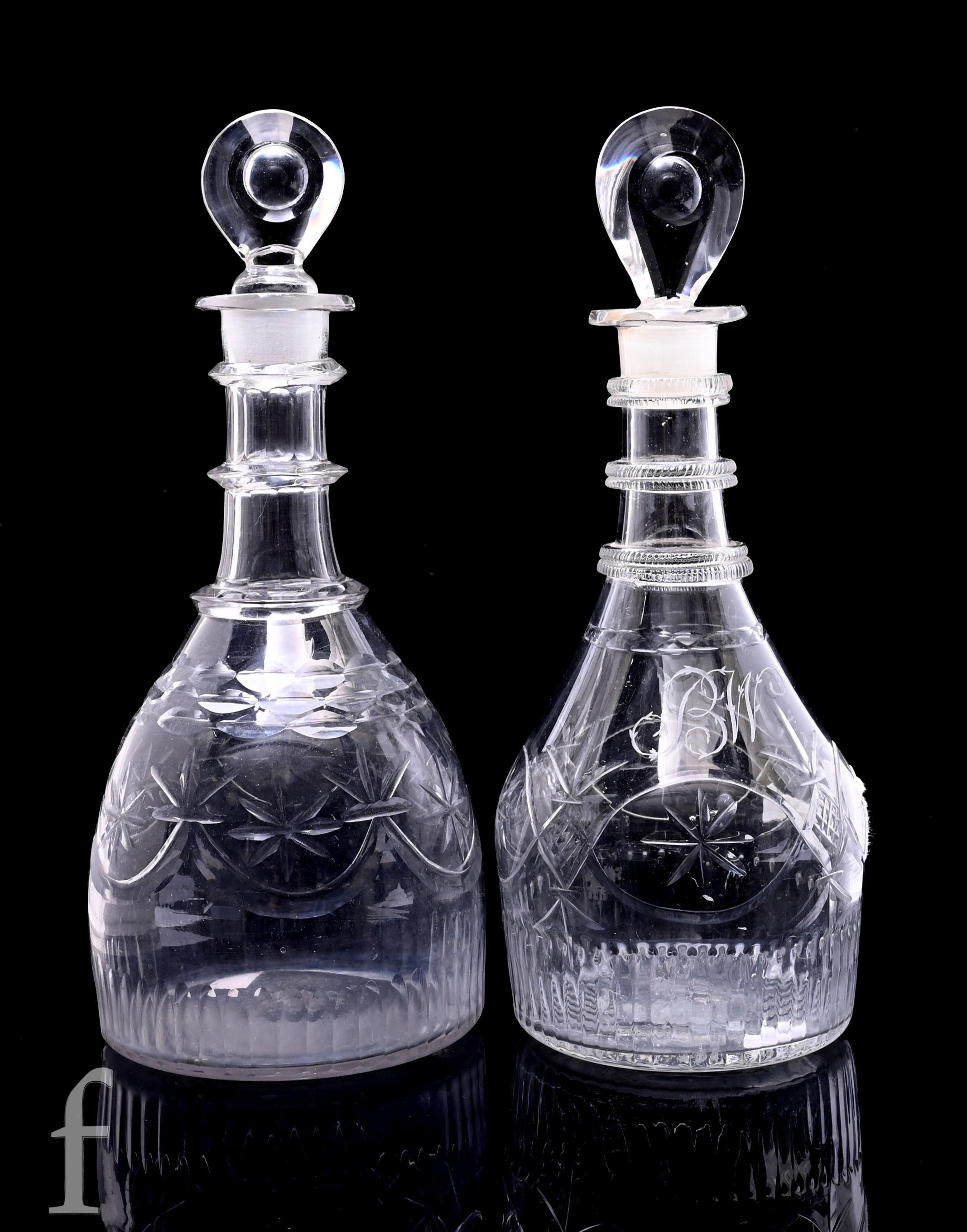 A late Georgian clear crystal decanter, the ovoid body cut with stars ...