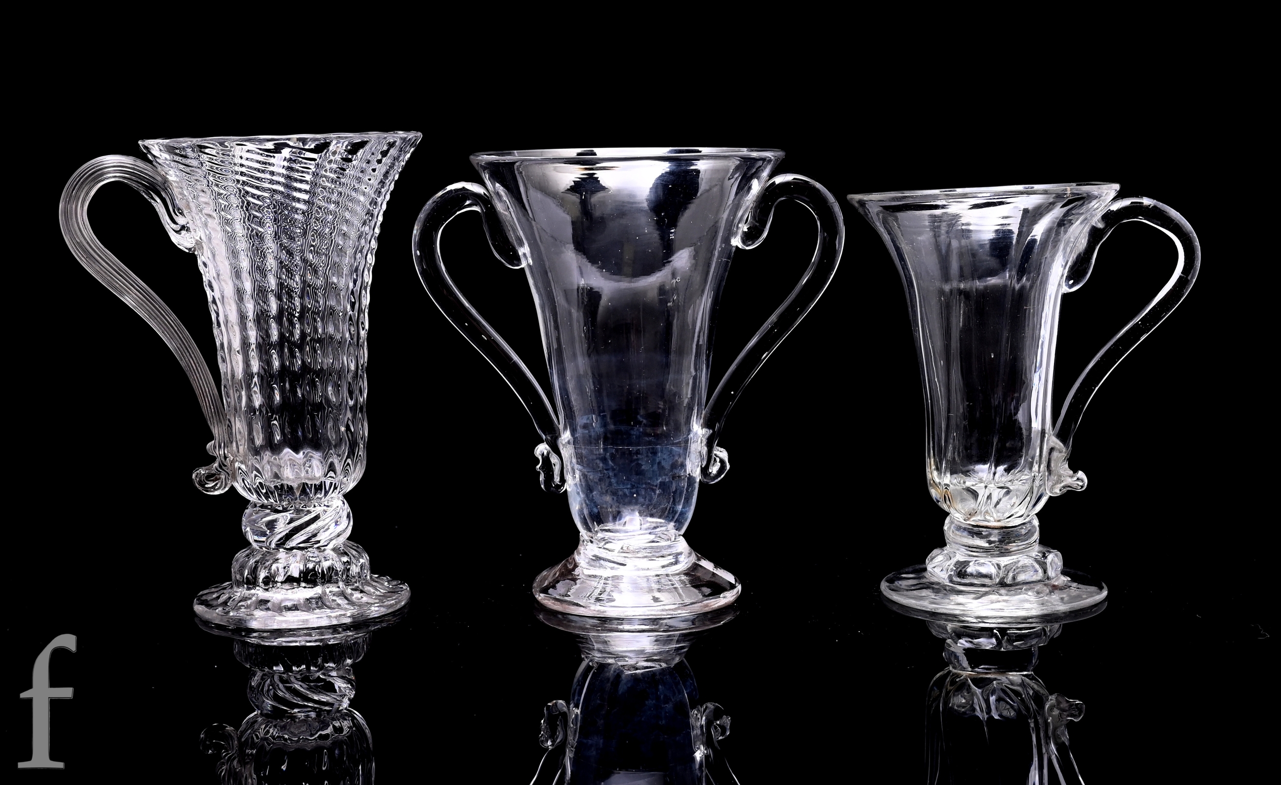 An 18th Century syllabub glass, circa 1750, fluted and wrythen moulded ...