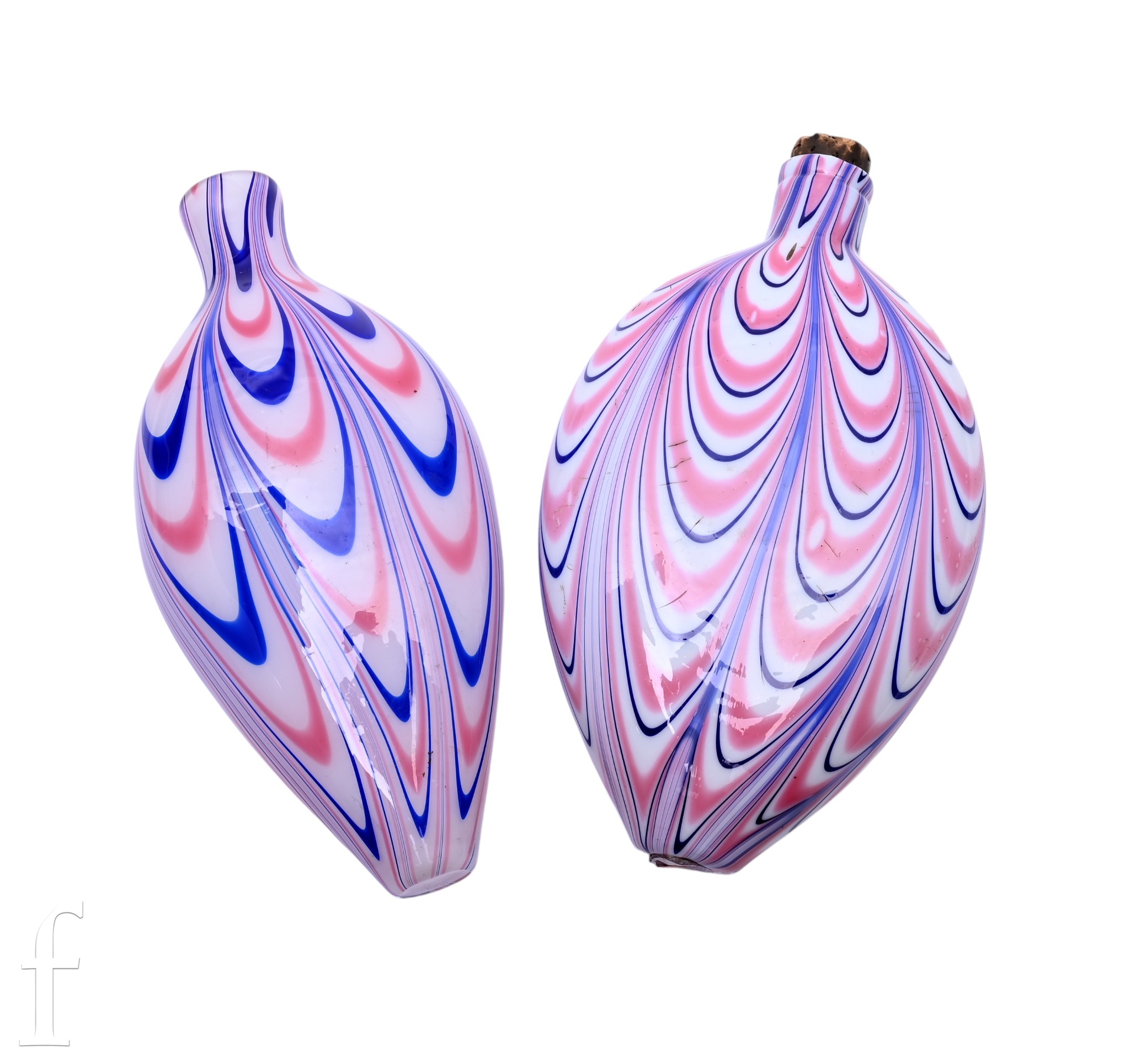 Two 19th Century Nailsea glass flasks, over flattened ovoid form, each ...