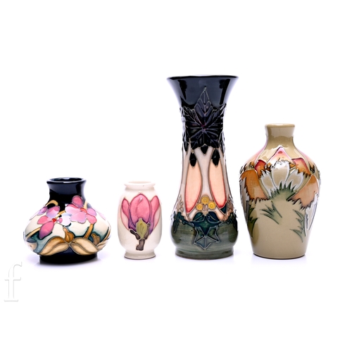 A Moorcroft Pottery vase of waisted sleeve form decorated in the Cluny ...