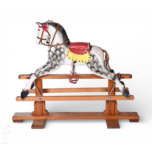 A mid 20th Century Leeway rocking horse, with dapple grey painted pine ...