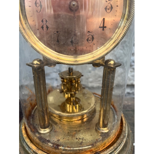 Antique Brass Skeleton Clock Under Glass Dome (20 cm W x 30 cm H)