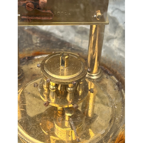 Antique Brass Skeleton Clock Under Glass Dome (20 cm W x 30 cm H)