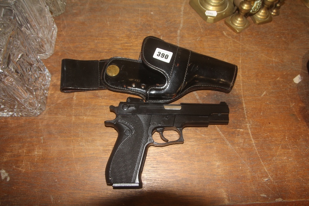 A Jay Pee Leather Spring Lock Holster With Bb Pistol