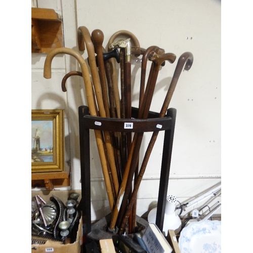 An Oak Stick Stand & Sticks