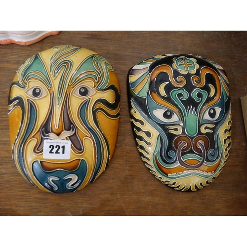 Two Glazed Pottery Wall Masks