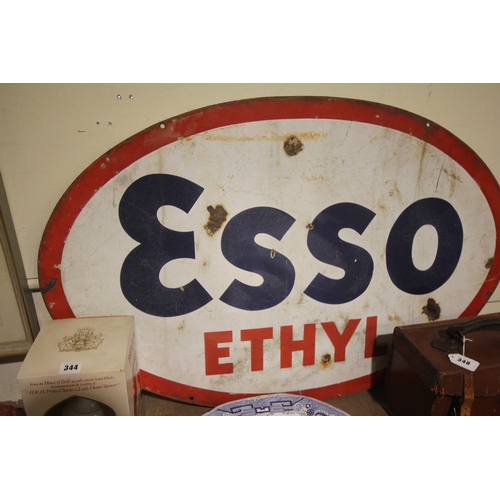 A Large Oval Enamel Sign For Esso