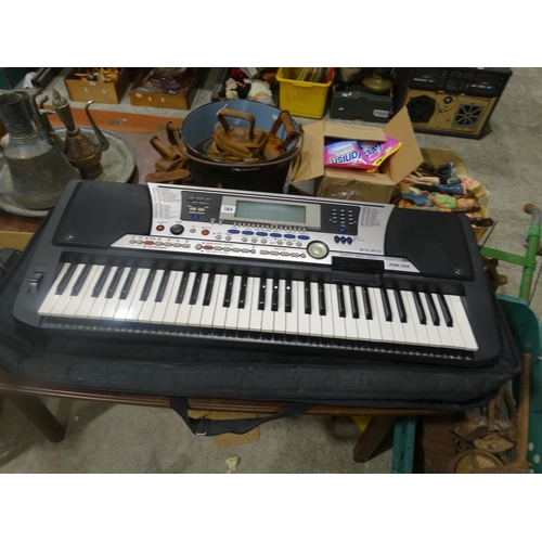 A Yamaha PSR-550 Keyboard, Together With Carry Case & Folding Stand