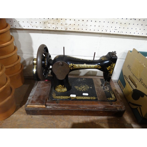 A Vintage Cased Singer Sewing Machine