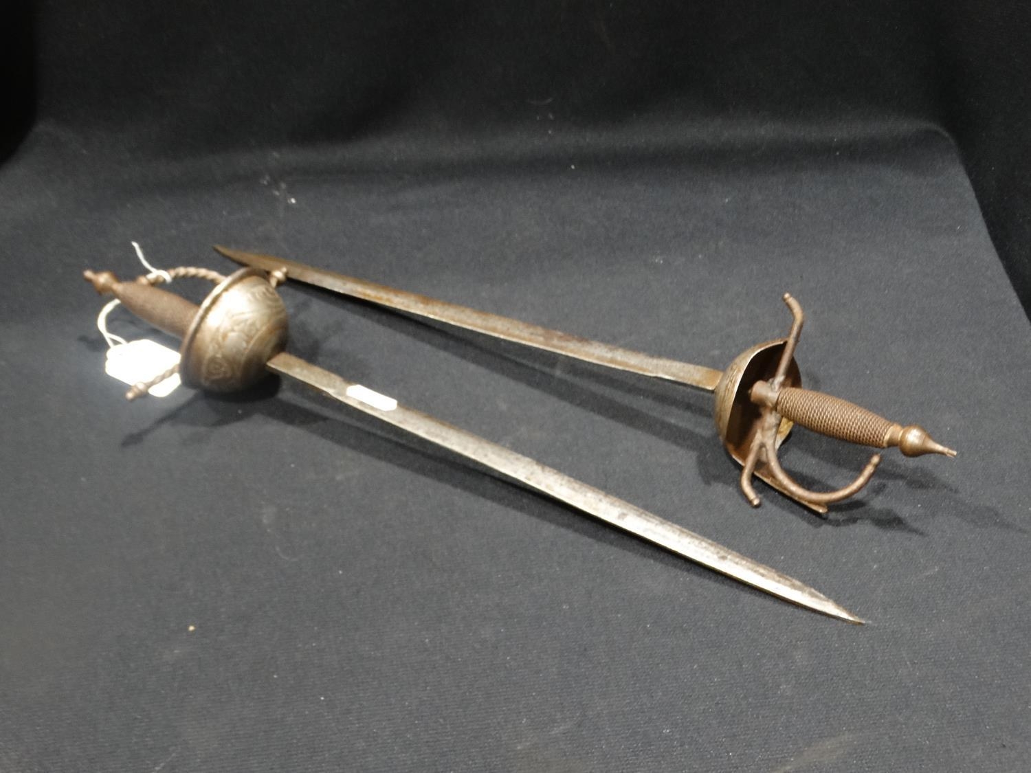 A Pair Of Ornamental Swords
