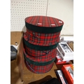 A Set Of Three Tartan Finish Circular Storage Boxes