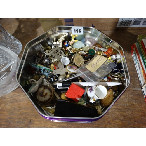 A Tin Box Of Collectables