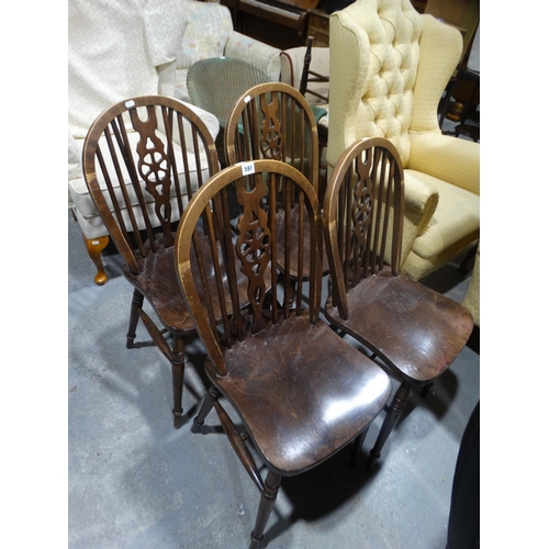 A Set Of Four Windsor Wheel Back Chairs