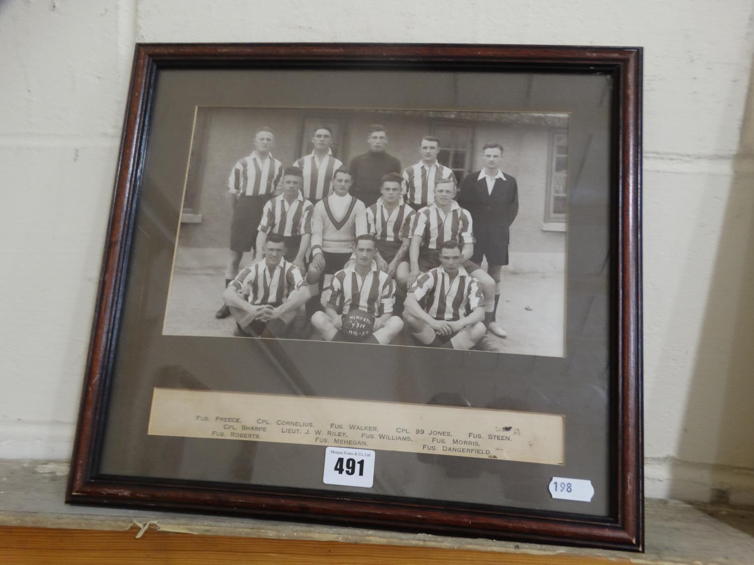 A Framed Photograph Of A 1930s Football Team