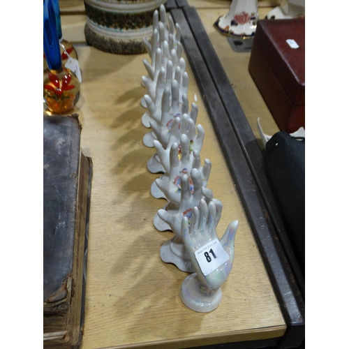 A Group Of Ceramic Hand Figures