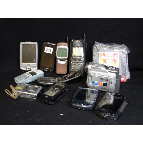 A Collection Of Vintage Mobile Phones Together With A Camcorder Etc