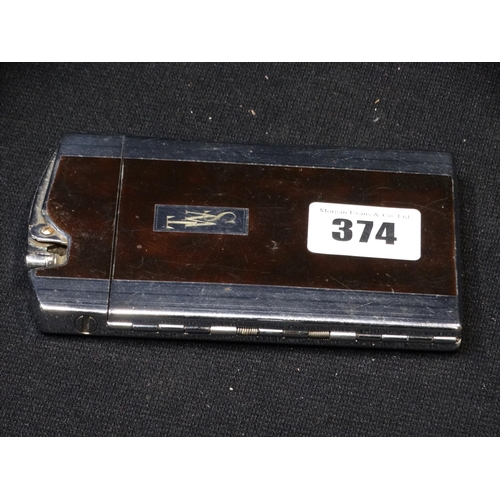 A Chrome And Enamel Lighter And Cigarette Case