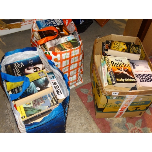 Two Bags Of Books Together With Two Boxes Of Books