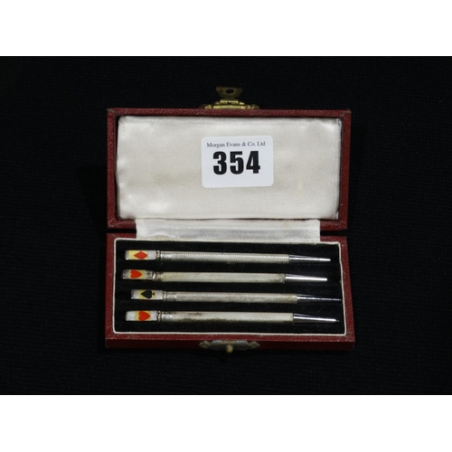 A Boxed Set Of Four Sterling Silver Propelling Pencils For Bridge