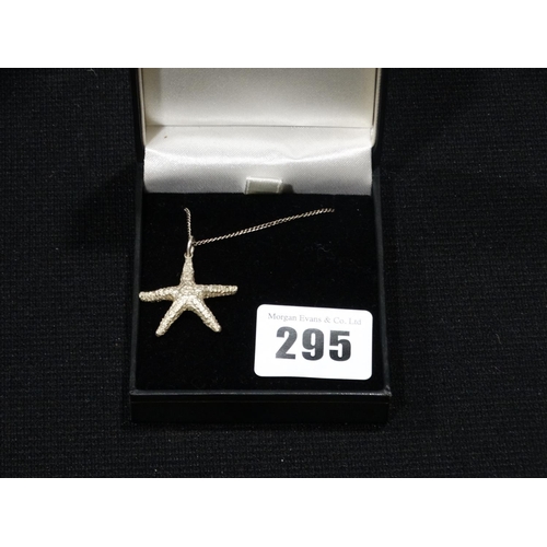 A Silver Star Fish Pendant On A Silver Chain