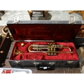 A Cased Brass Finish Trumpet